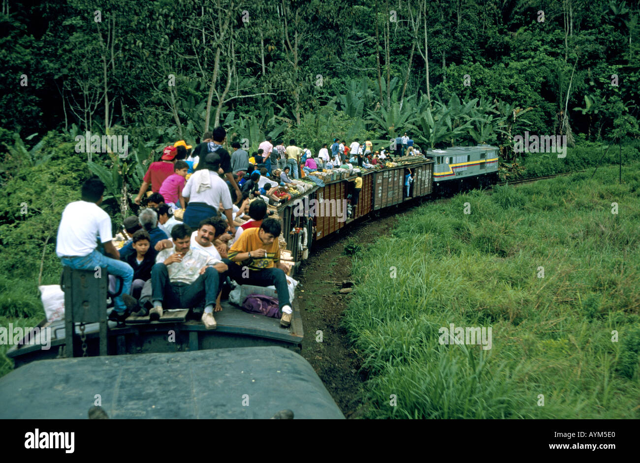 Riding on the roof of a train from Duran Ecuador Stock Photo - Alamy