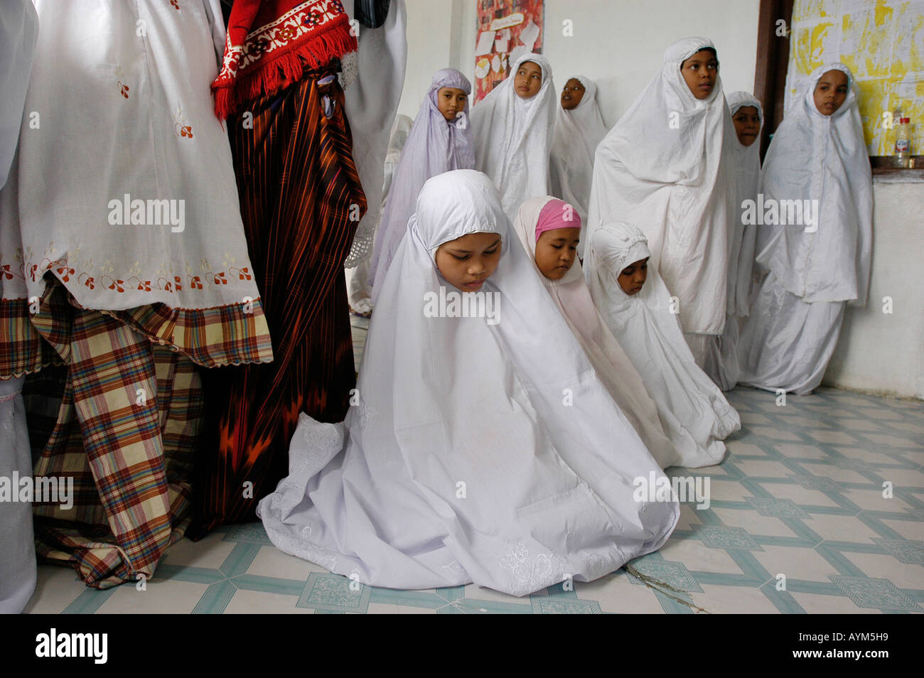 Muslim girls in Banda Aceh Indonesia during their midday prayer Stock ...
