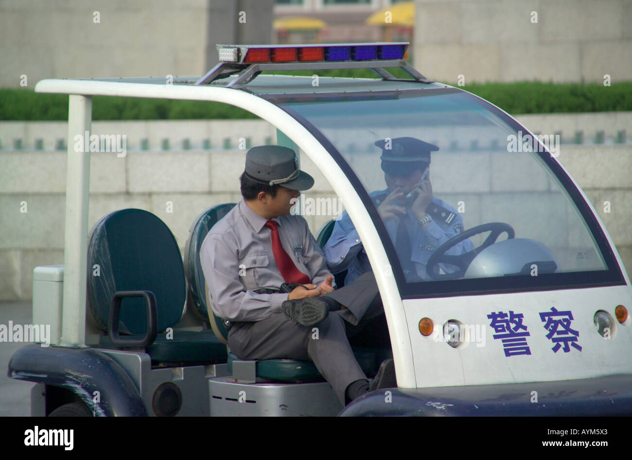 Shanghai Police on mobile phone Stock Photo - Alamy