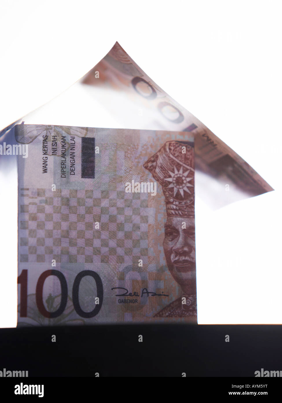 Close shot and crop picture of ringgit malaysia folded in shape of a ...