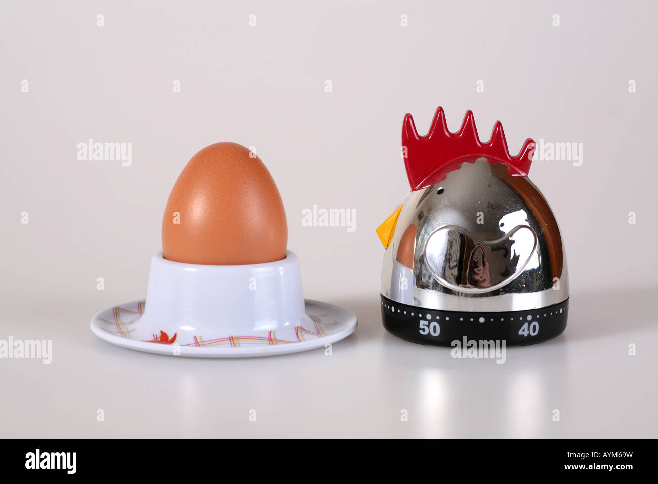 Egg with timer Stock Photo - Alamy