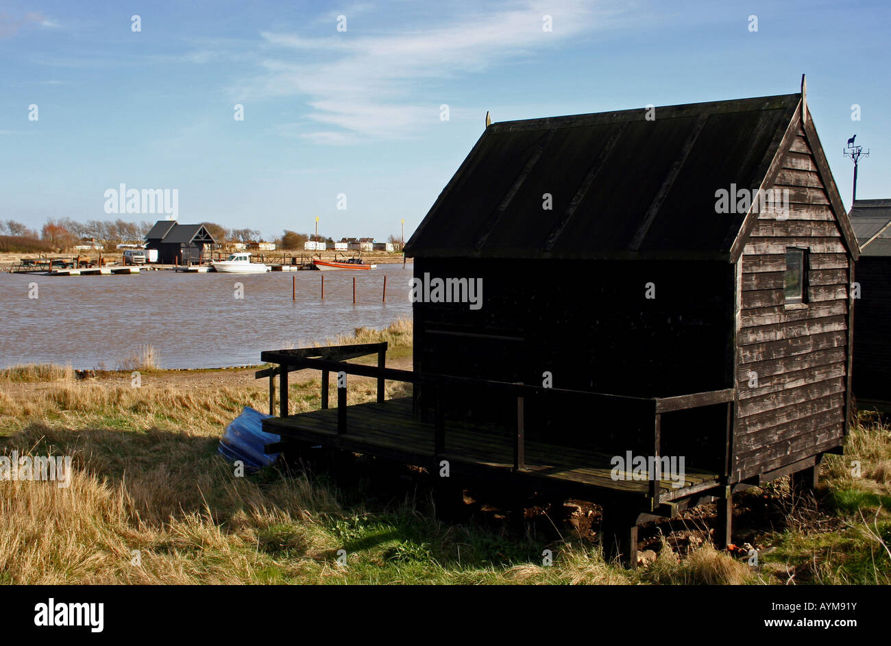 OLD BEACH HUT BESIDE THE RIVER BLYTH AT WALBERSWICK. SUFFOLK. ENGLAND ...