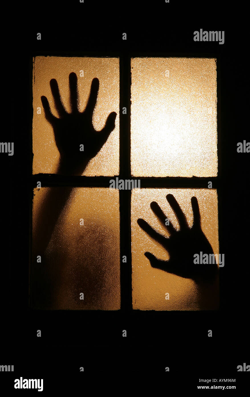 Hands clutching at a window in a horror movie style Stock Photo - Alamy