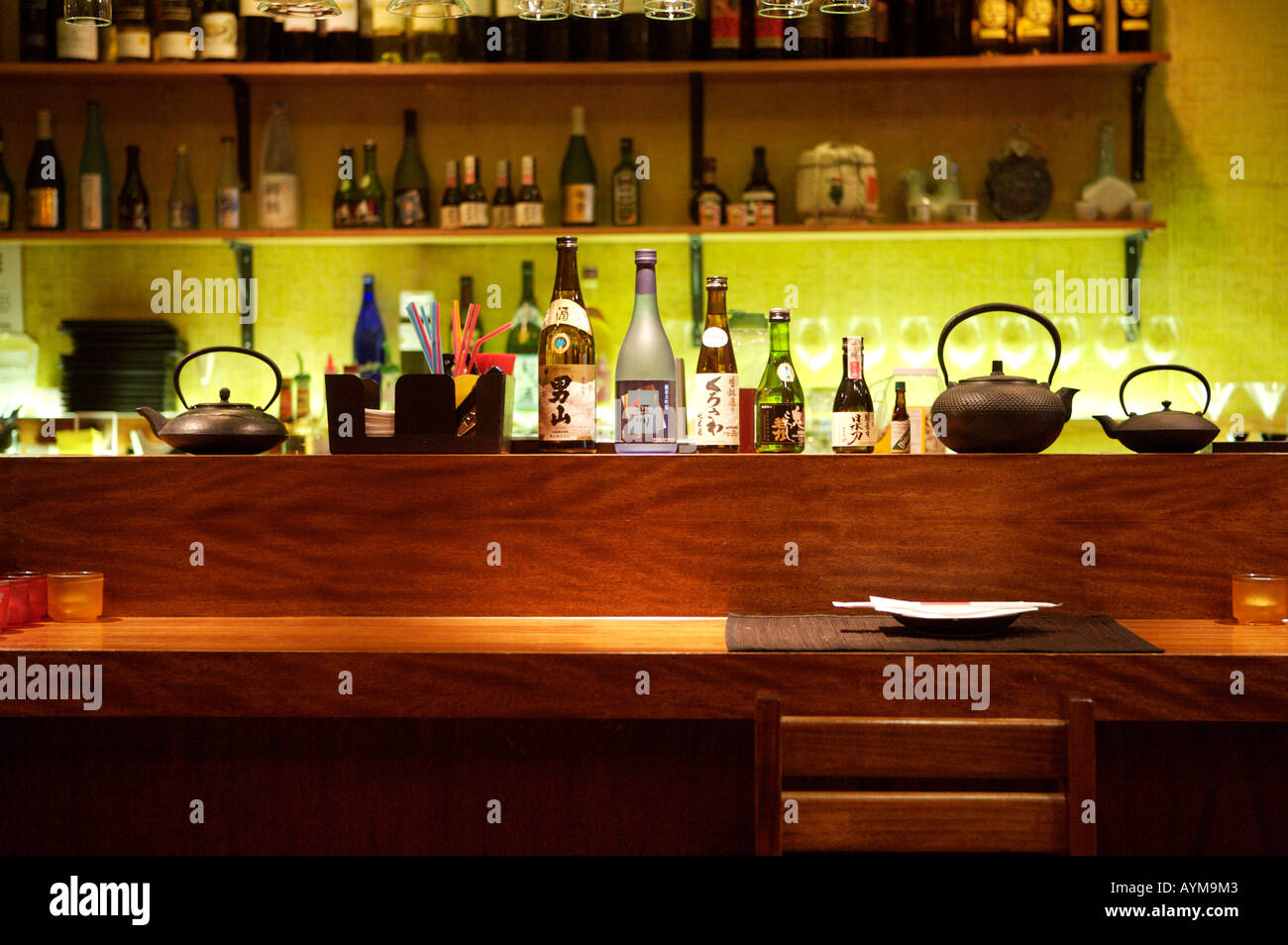 Sushi bar counter, with different kinds of Sake Stock Photo - Alamy