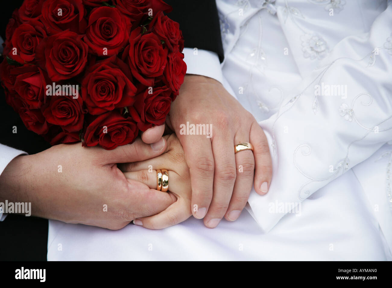 Wedding couple showing hands flowers hi-res stock photography and ...