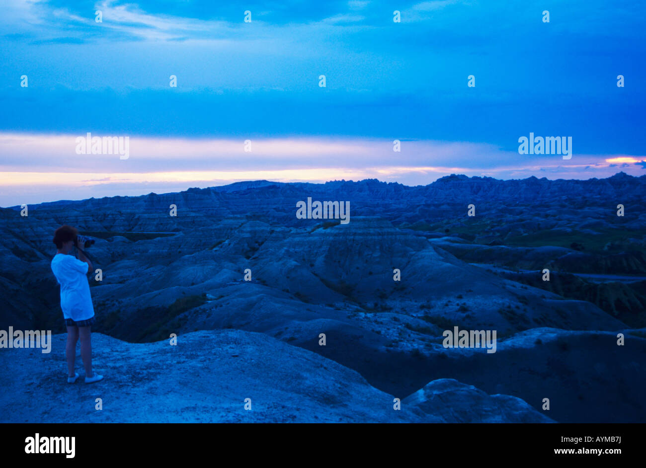 Sunset at Badlands National Park sand formation volcanic shaped tourist ...