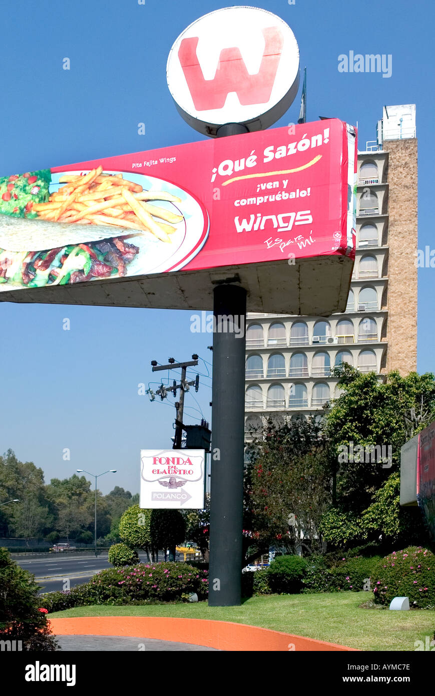 Advertising sign and skyscraper in Mexico City Stock Photo - Alamy