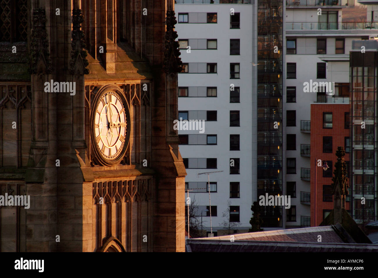 Leeds St Peters Parish church clock tower with new apartments behind ...
