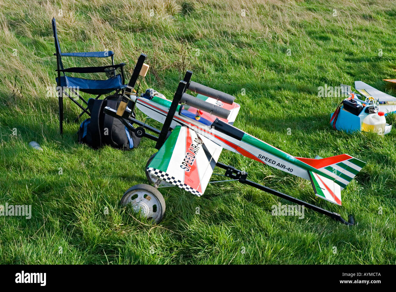 Model radio controlled airplanes waiting on the ground in readiness to ...
