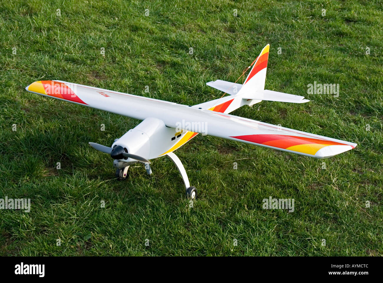 Model radio controlled airplanes waiting on the ground in readiness to ...