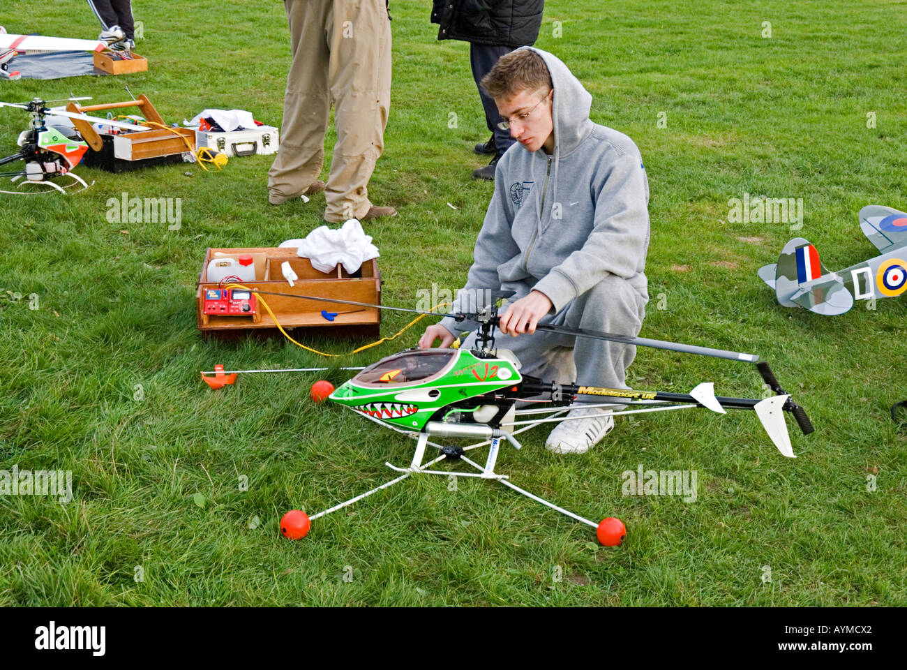 Preparing model radio controlled airplanes for flight in Epping Forest ...