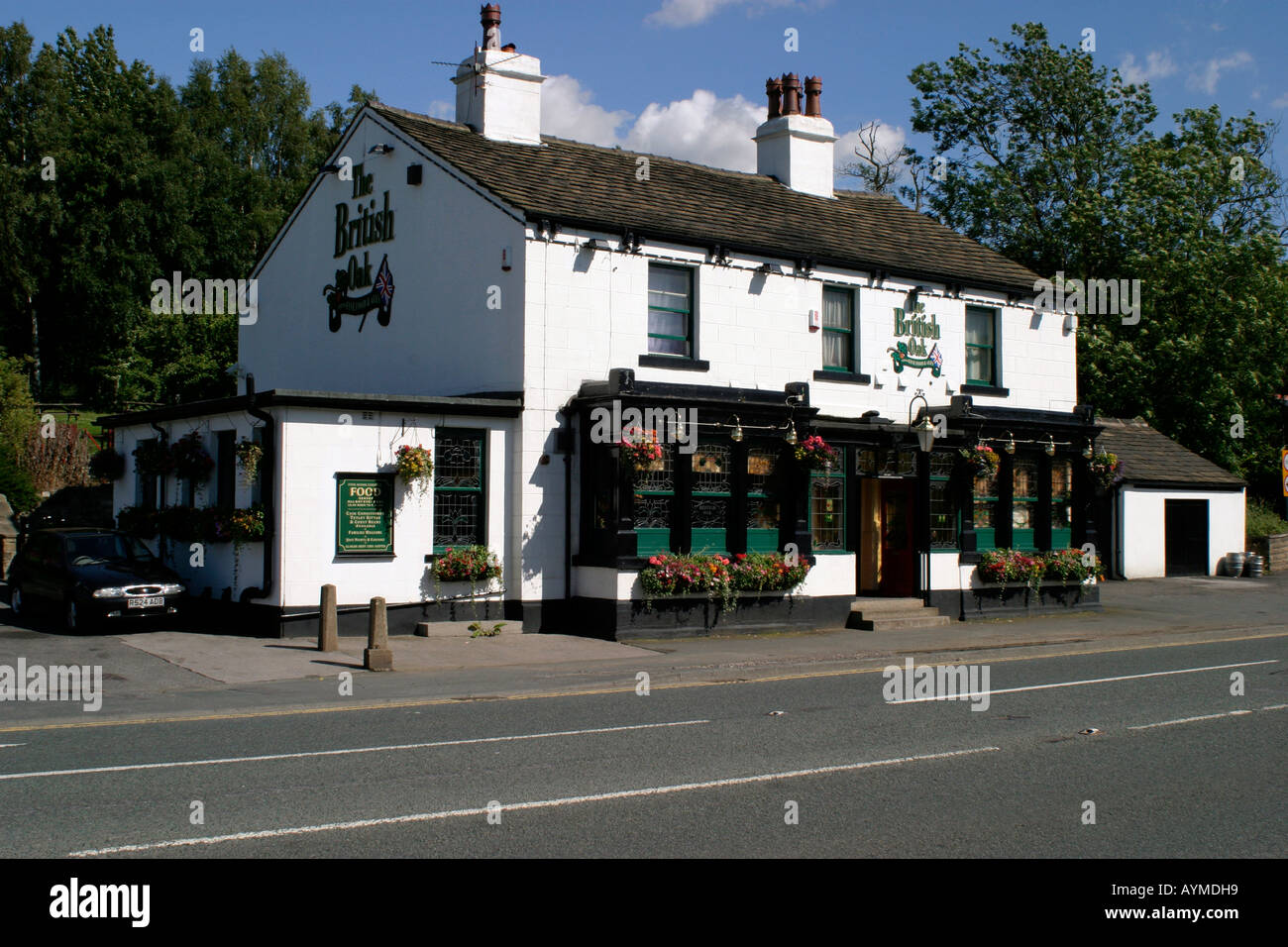 Typical Yorkshire Pub at the side of the road Hanging baskets and ...