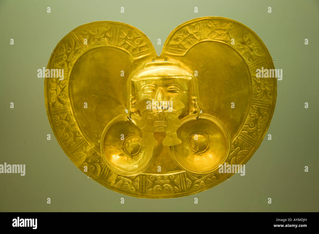 A gold pectoral from the Calima people in Restrepo, Valle del Cauca, in ...