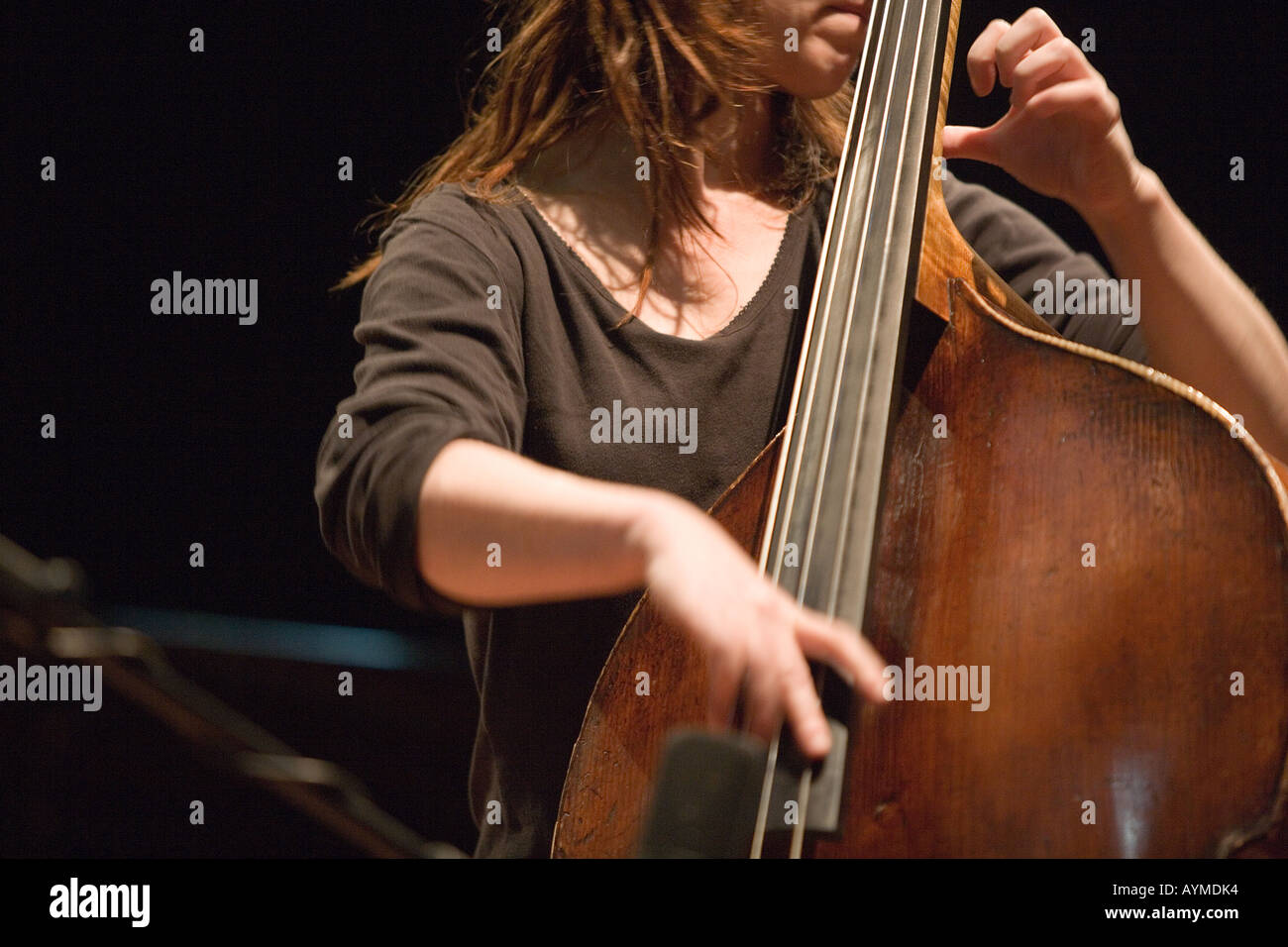 woman playing bass Stock Photo - Alamy