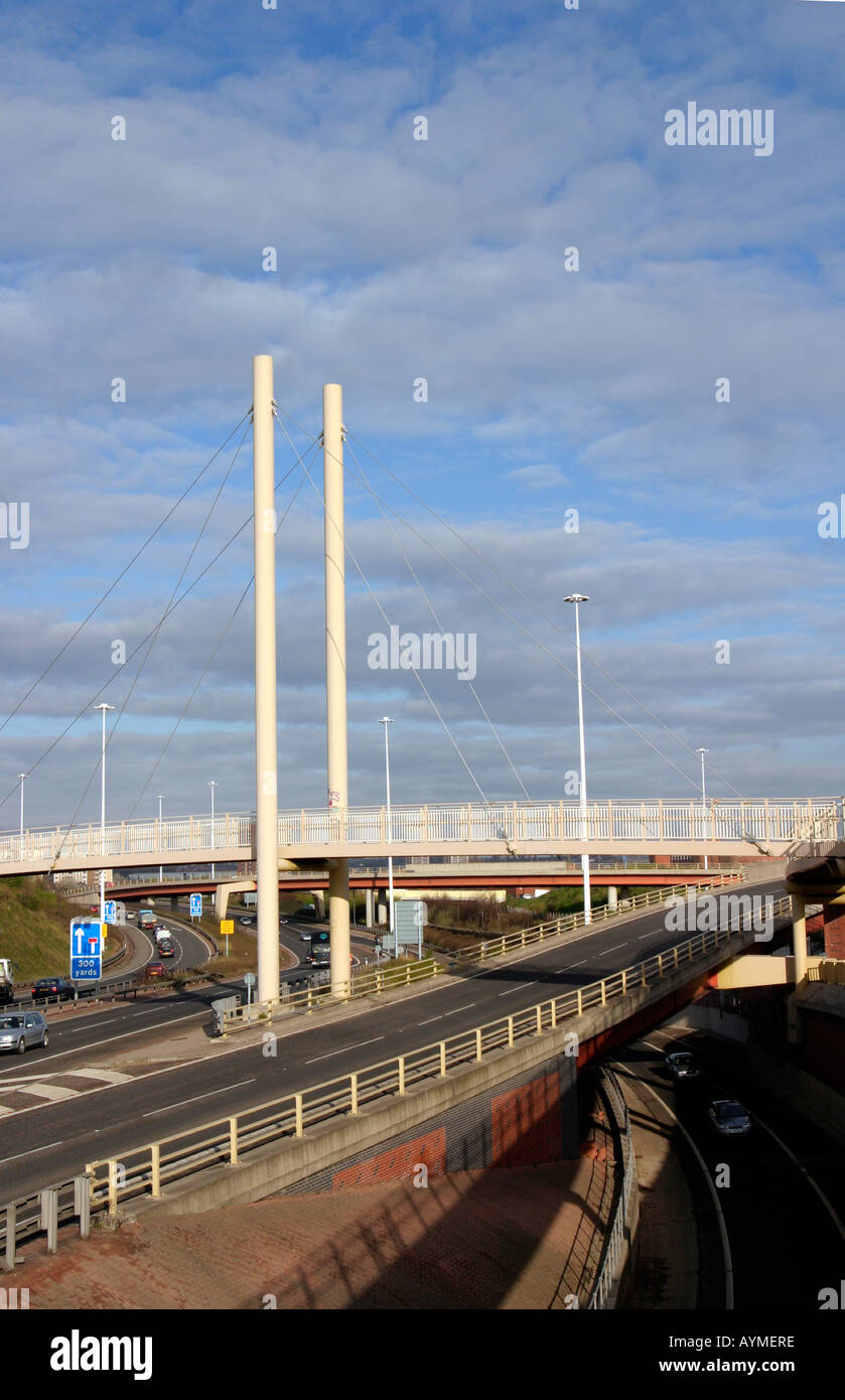 M621 from Dewsbury Road with footbridge over several roads and railway ...