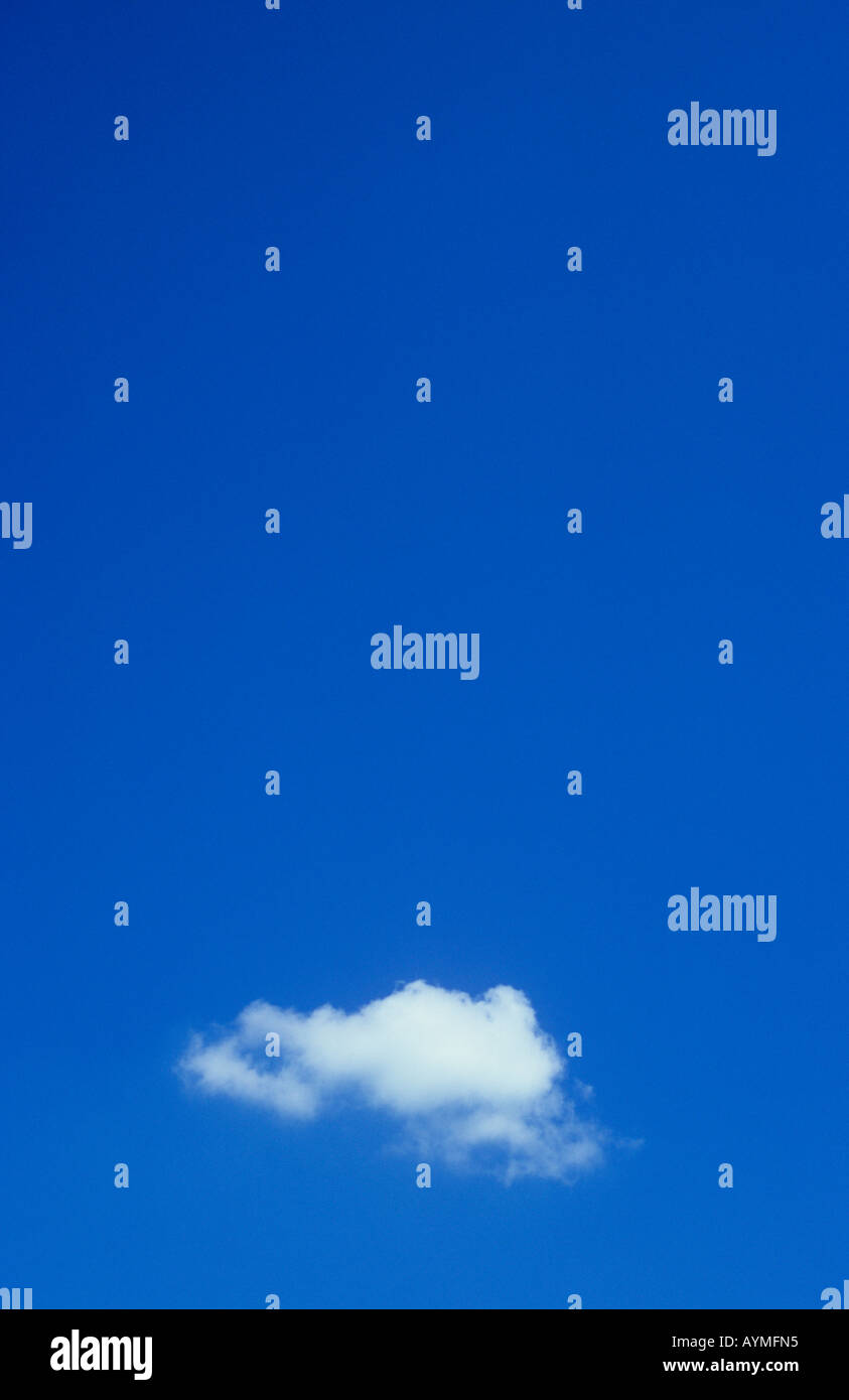 Cheeky little puff of white cumulus cloud against an otherwise ...