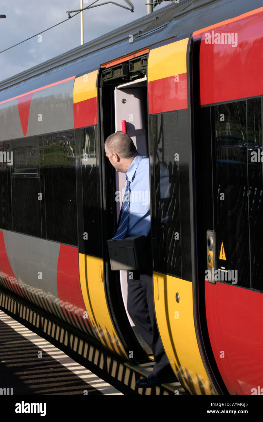 Train platform guard england hi-res stock photography and images - Alamy