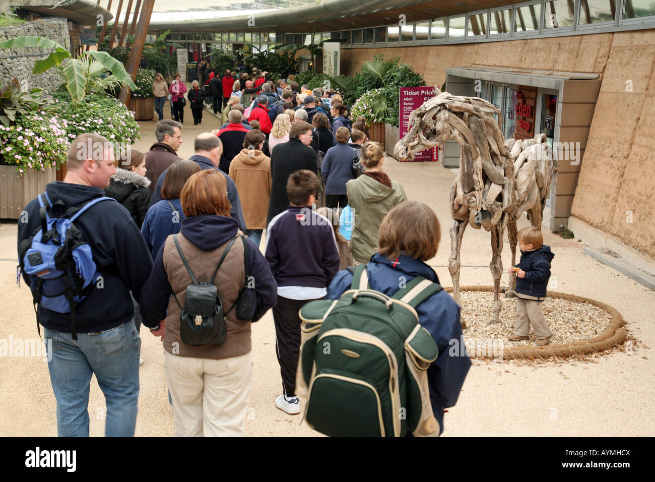 Cornwall tourists; people including children waiting in a queue to ...