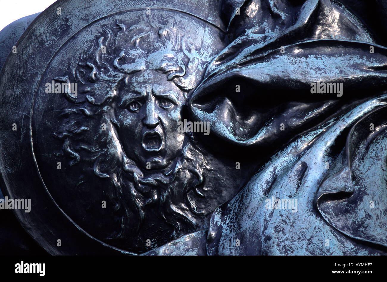 Detail of a face on the Victoria Monument in front of Buckingham Palace ...