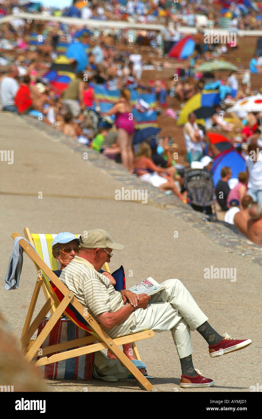 The busy scene at Paignton beach in Devon UK Stock Photo - Alamy