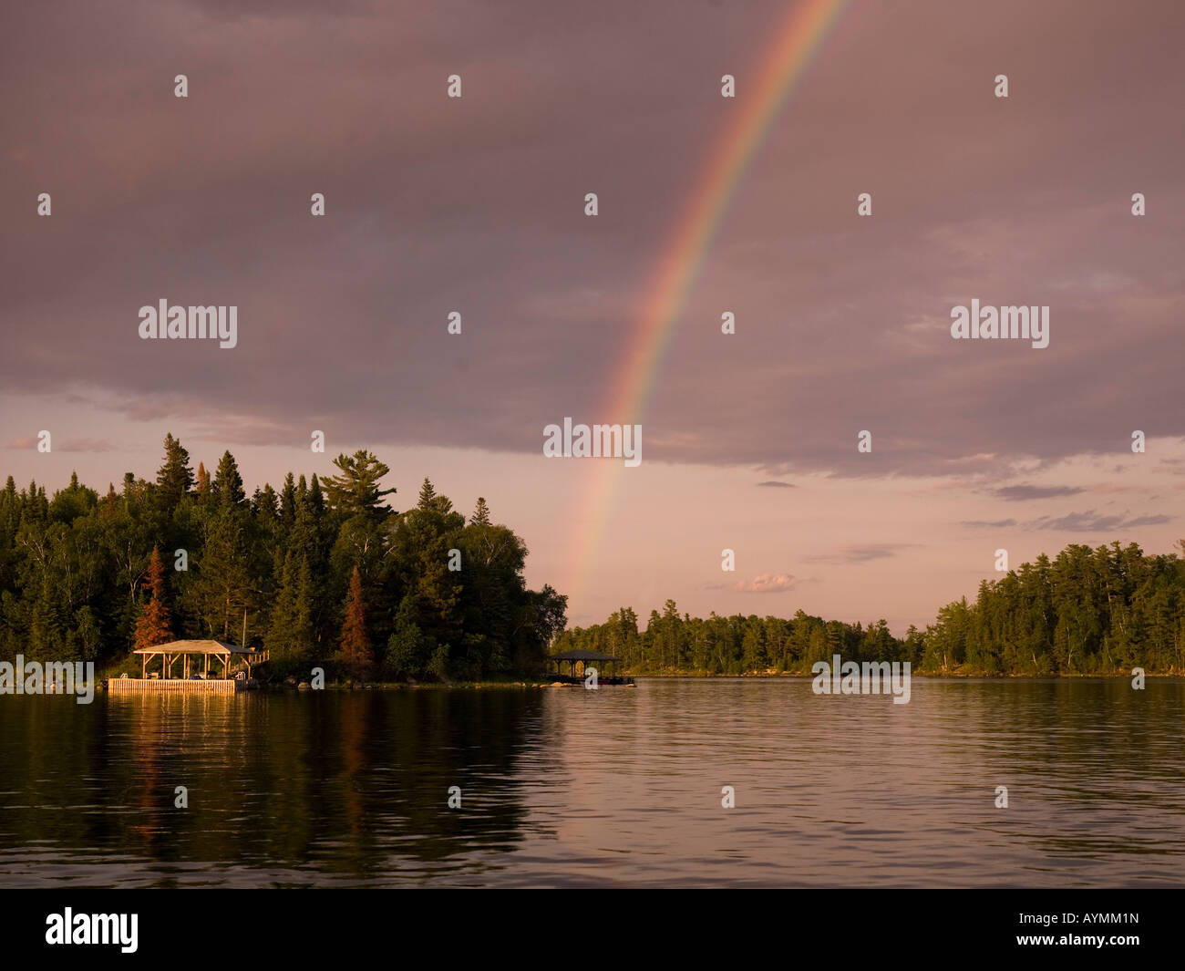 Lake of the Woods, Ontario, Canada, Rainbow over the lake Stock Photo ...