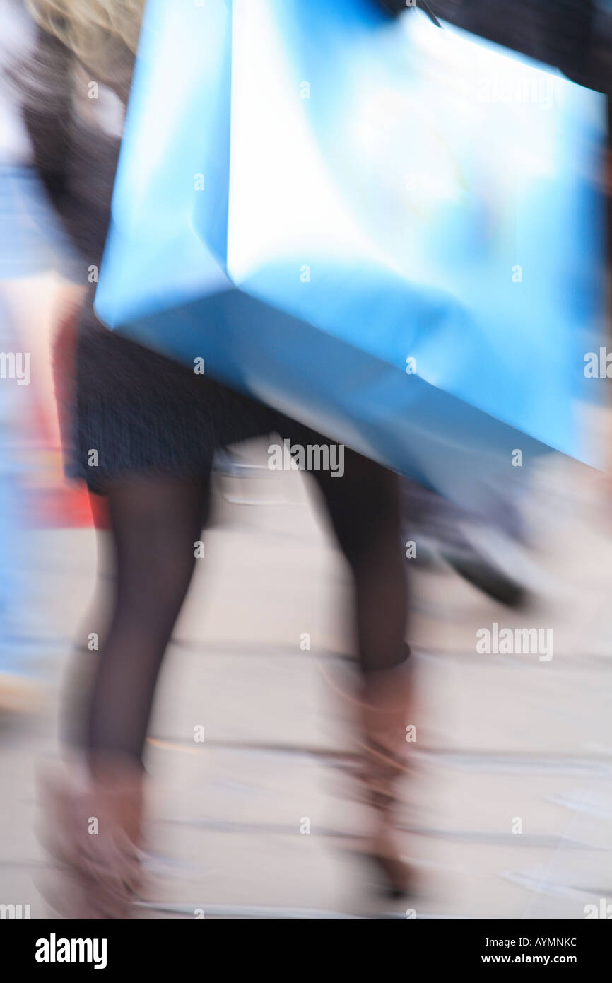 Shopper pedestrian shopping walking bags fashion path pavement Stock ...