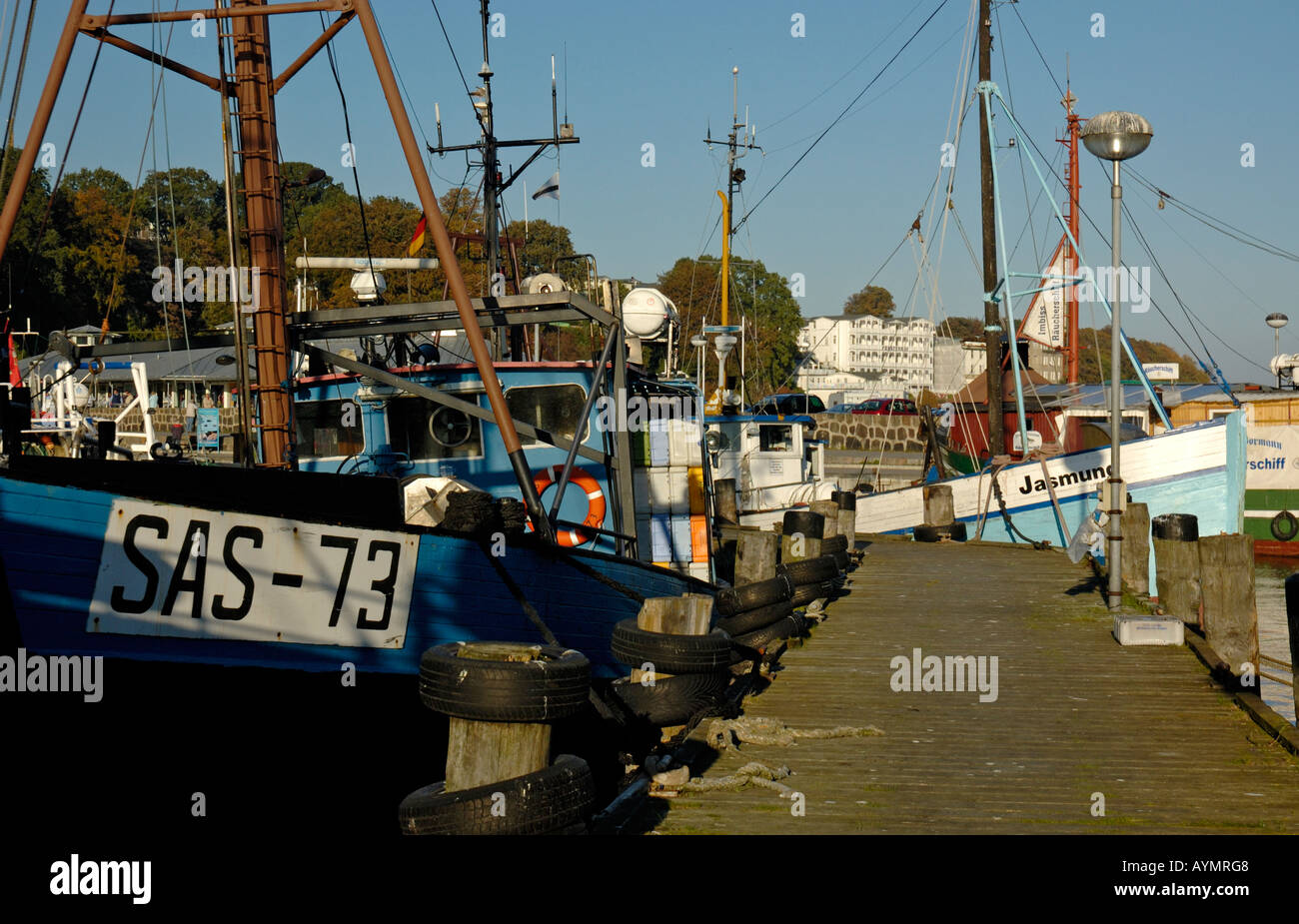 Sassnitz, Ruegen, Germany; evening at the fishing harbour Stock Photo ...