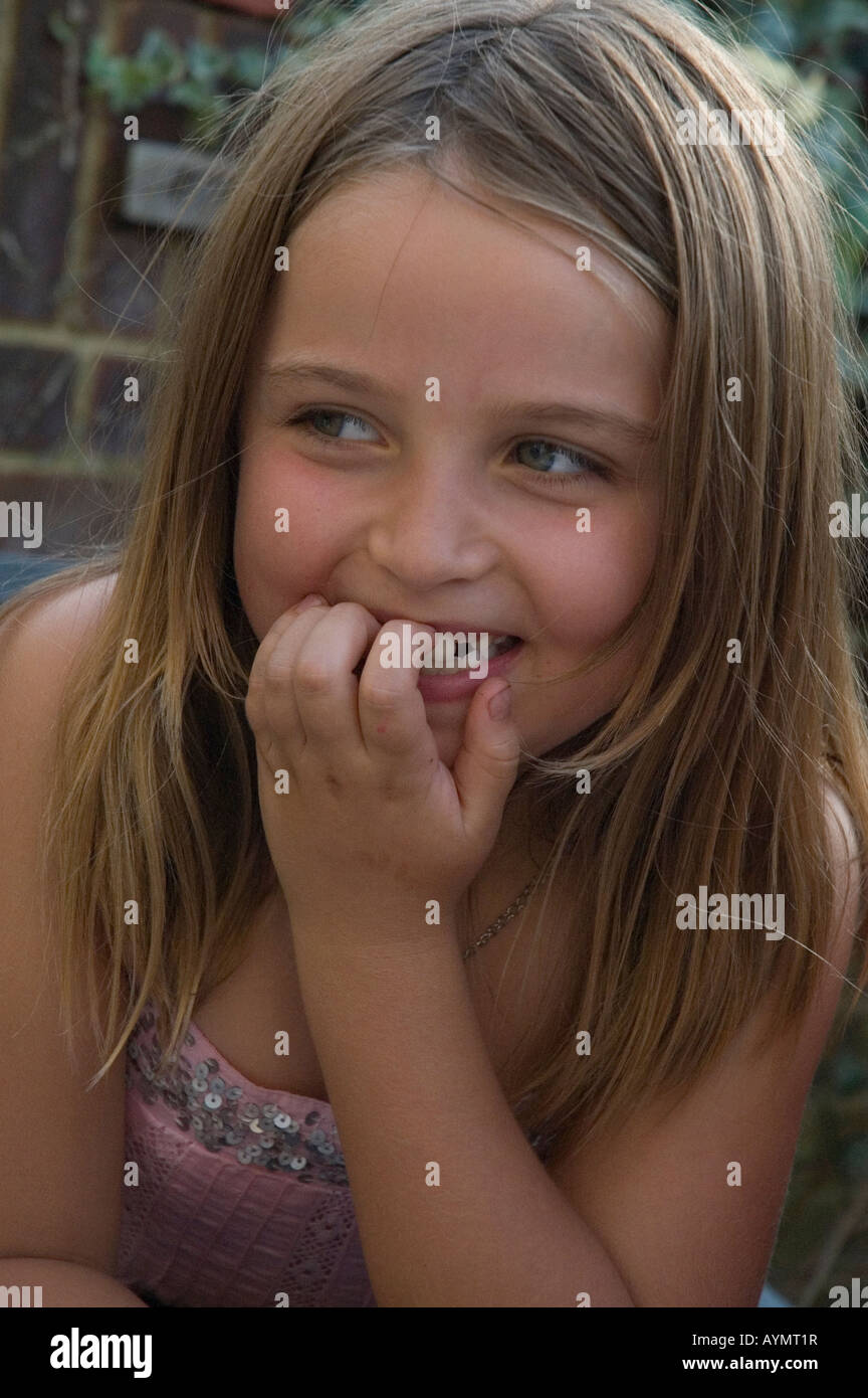 Young girl smiling.Aged 7 Stock Photo - Alamy
