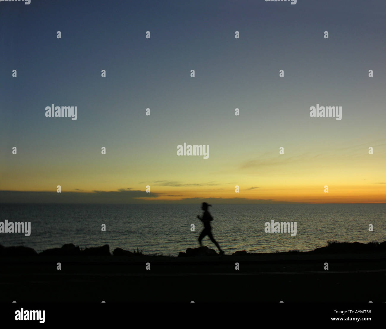 Sport woman running along night hi-res stock photography and images - Alamy