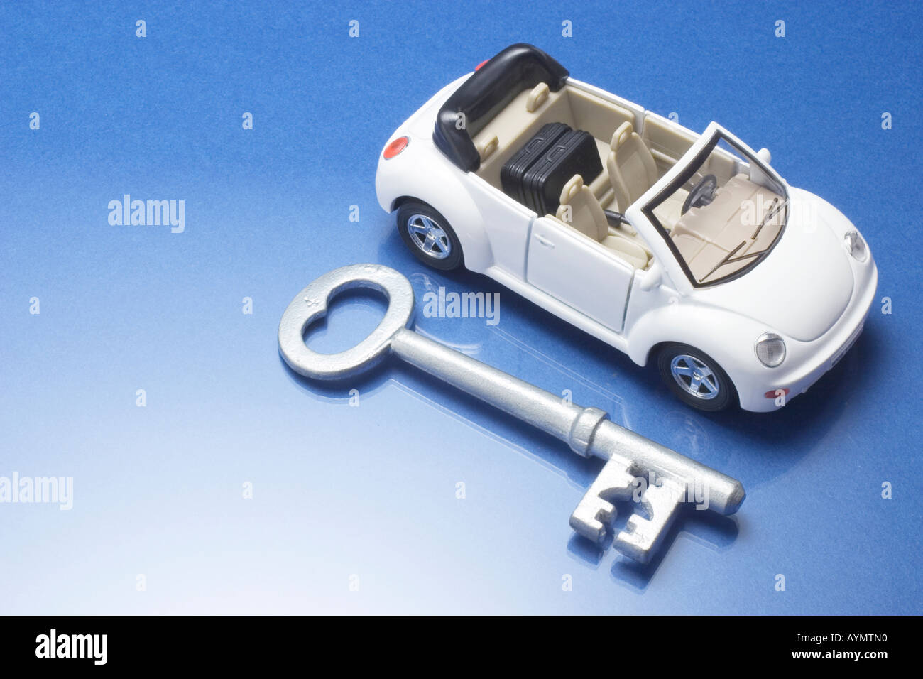 Skeleton Key and Miniature Sportscar Stock Photo - Alamy