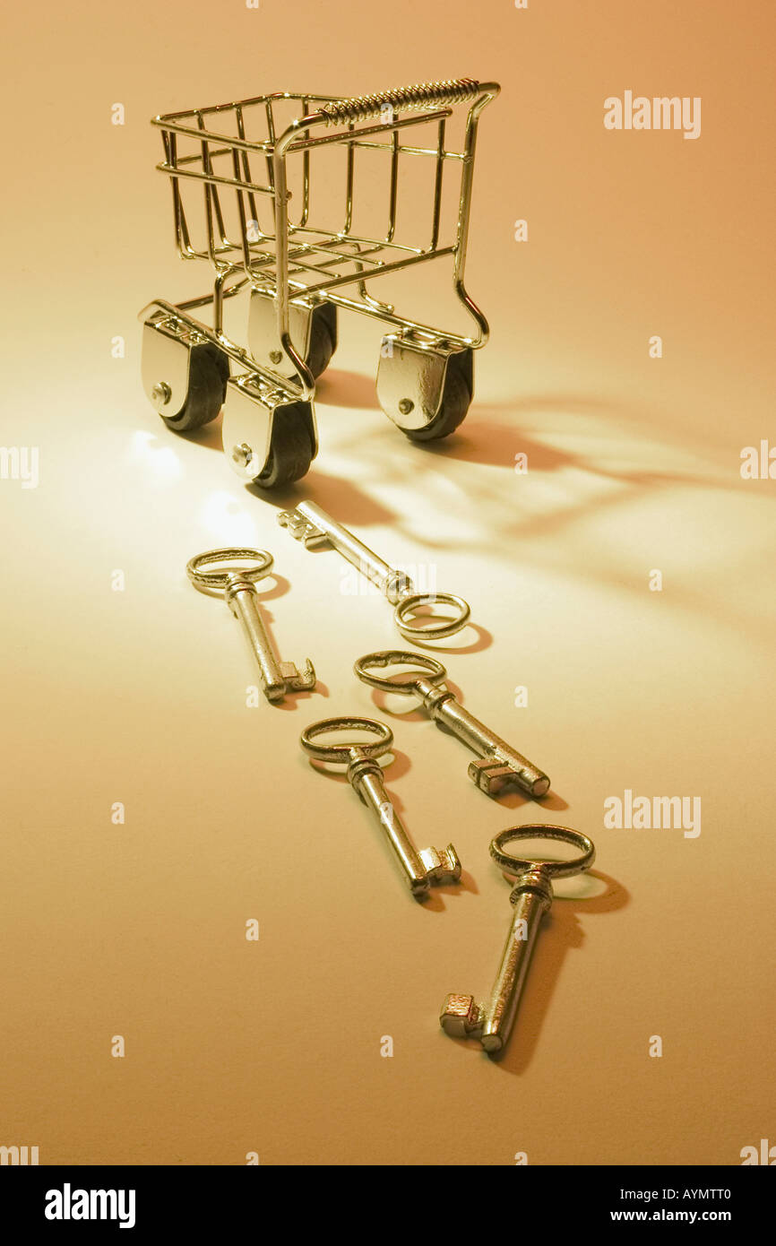 Skeleton Keys and Miniature Shopping Trolley Stock Photo - Alamy