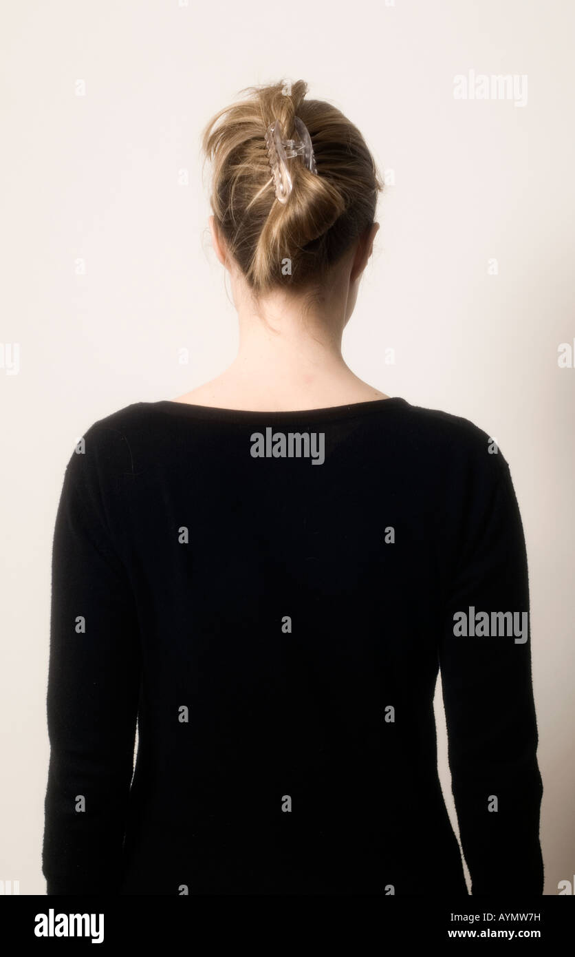 Pale neck: Blonde woman with her back turned Stock Photo - Alamy