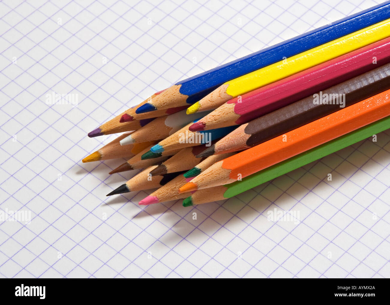 Colour pencils on a sheet of paper Stock Photo - Alamy