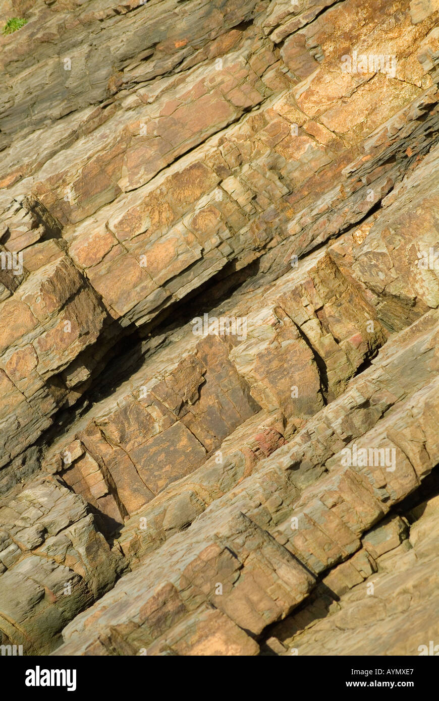 Rock strata cracks design diagonal pembrokeshire hi-res stock ...