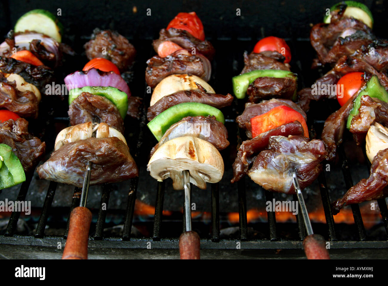Front view of BBQ sticks with meat and vegetables Stock Photo - Alamy