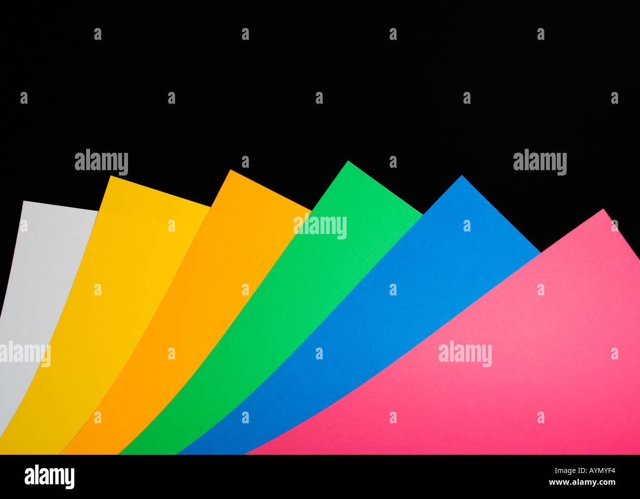 Colorful art paper sheets on a black background Stock Photo - Alamy