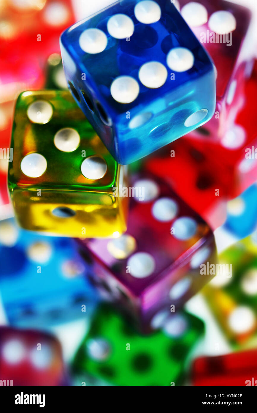 Six sided dice various colours Stock Photo - Alamy