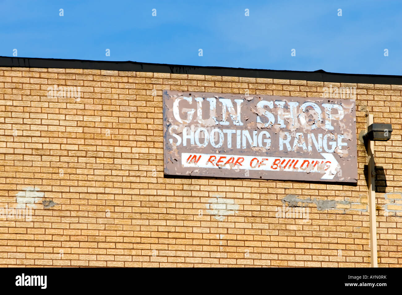 An old gun shop in the suburbs Stock Photo - Alamy