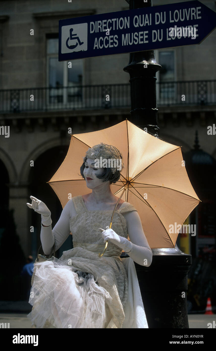 europe france paris a street performer Stock Photo - Alamy