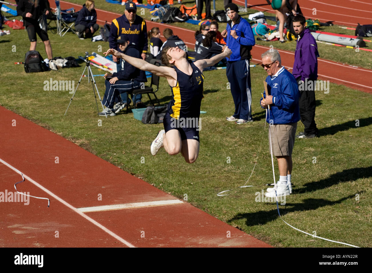 Athlete performs long jump Stock Photo - Alamy