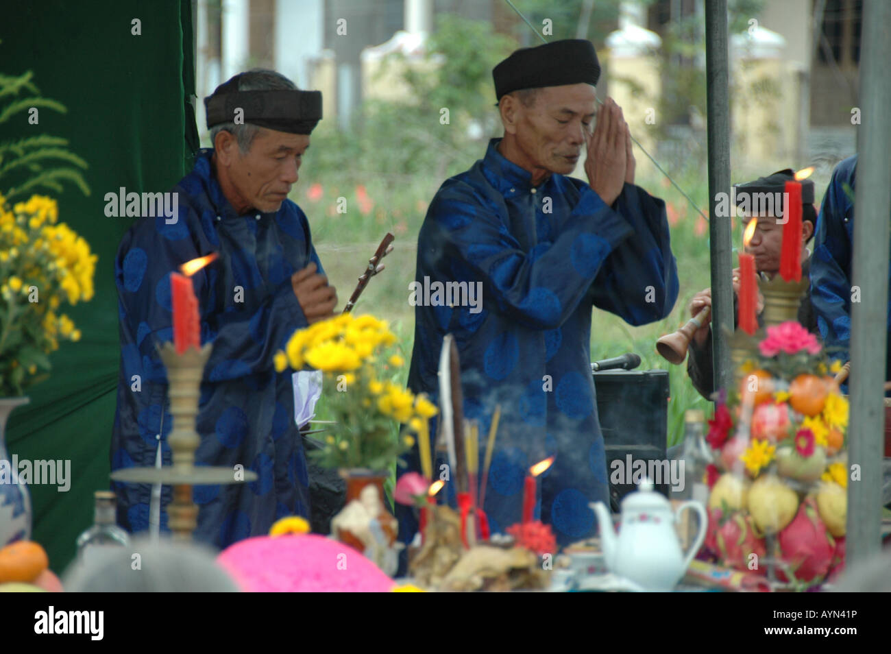 Priests blessing the offerings at a thanksgiving ceremony at an organic ...