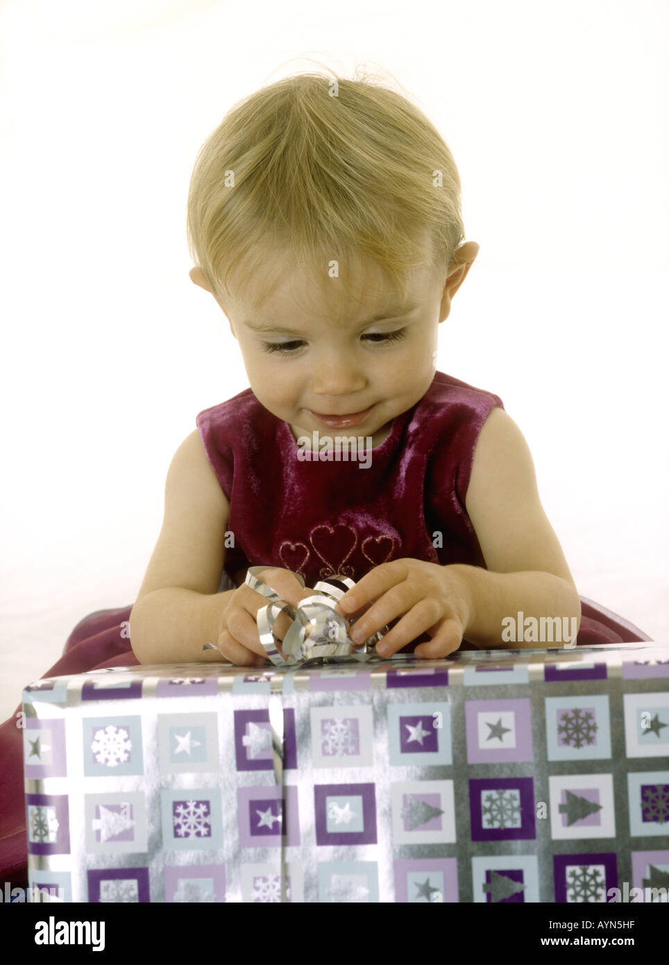 Unwrapping a parcel hi-res stock photography and images - Alamy