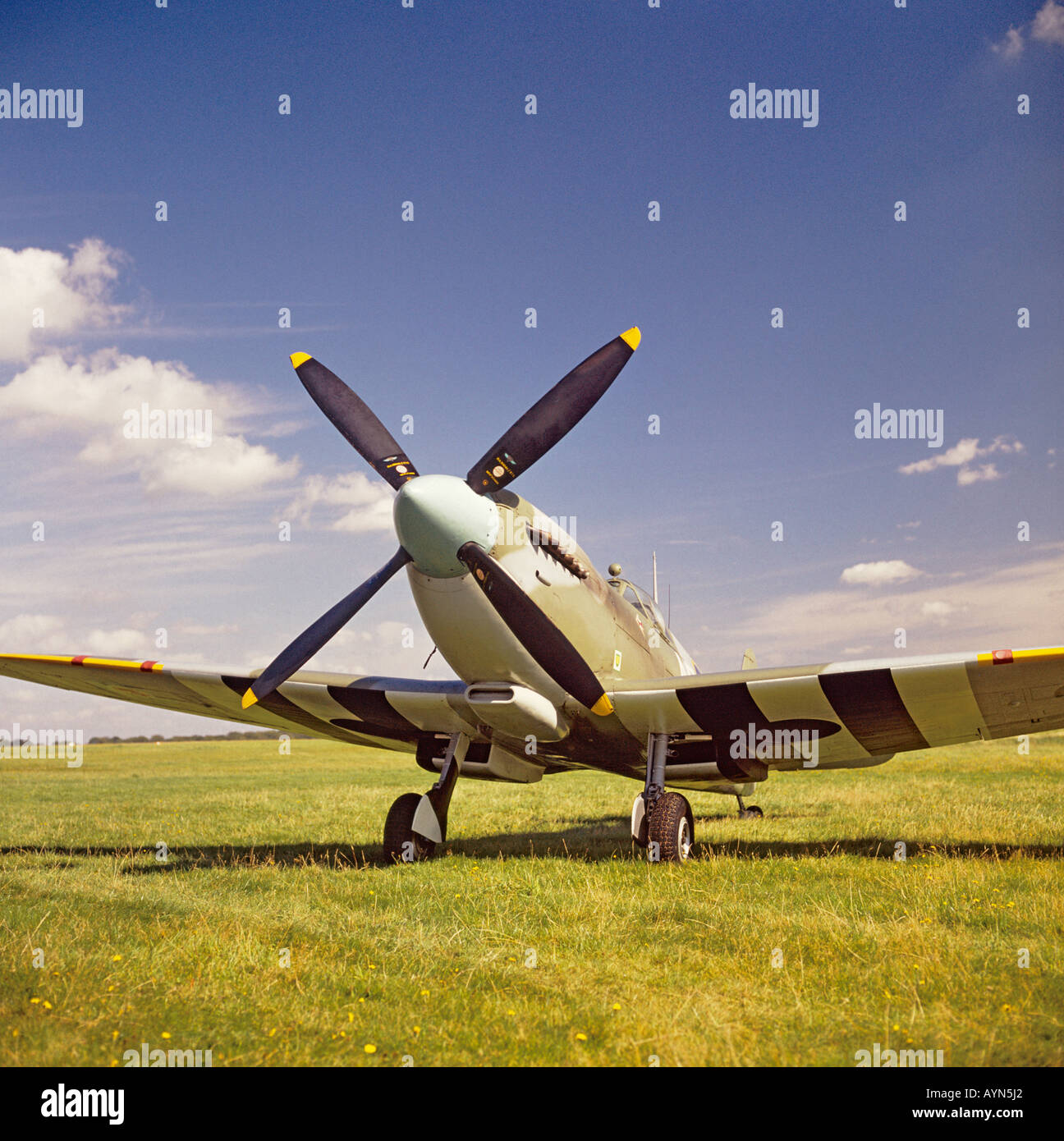 Supermarine Spitfire Mk IX MH434 on a grass airfield in UK Stock Photo ...