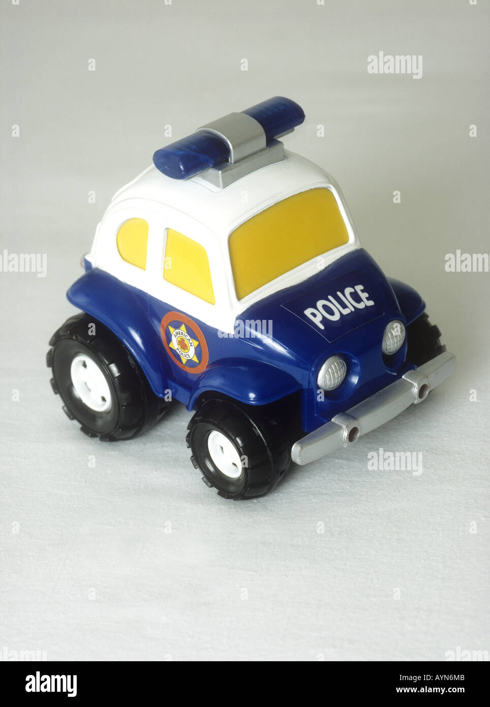 Toy plastic police car on white background Stock Photo - Alamy
