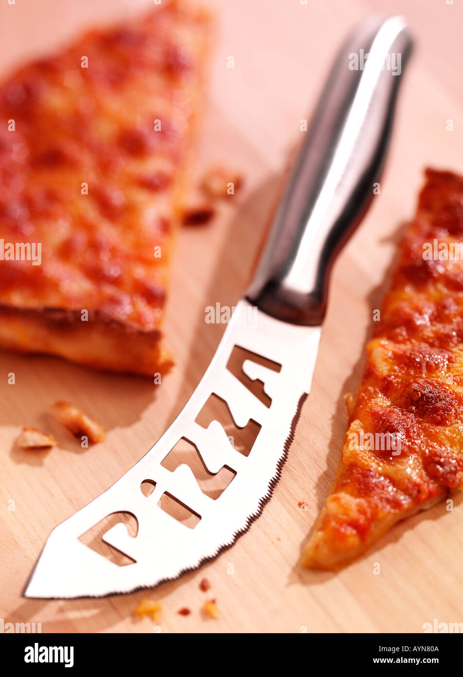 Pizza with knife hi-res stock photography and images - Alamy