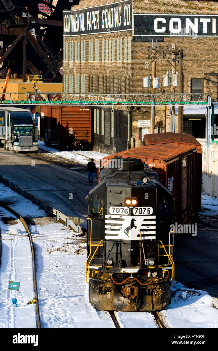 A Norfolk Southern train switches an industry on the south side of ...