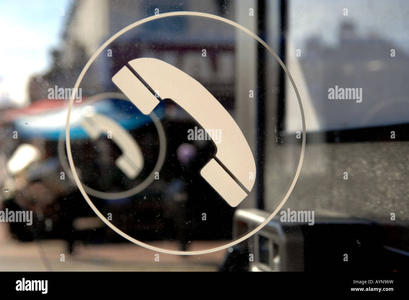 BT phone sign on the window of a telephone booth Stock Photo - Alamy