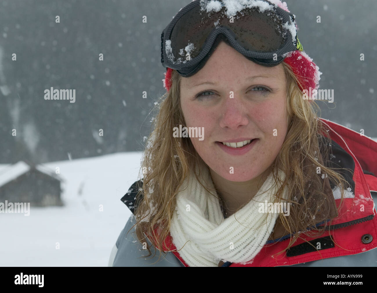 portrait of girl in snow wearing skigoggles on head Stock Photo - Alamy