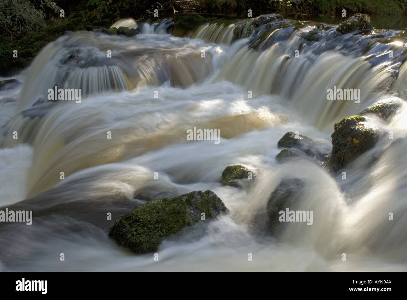 Tumbling cataracts on the River Teign below Castle Drogo Stock Photo ...