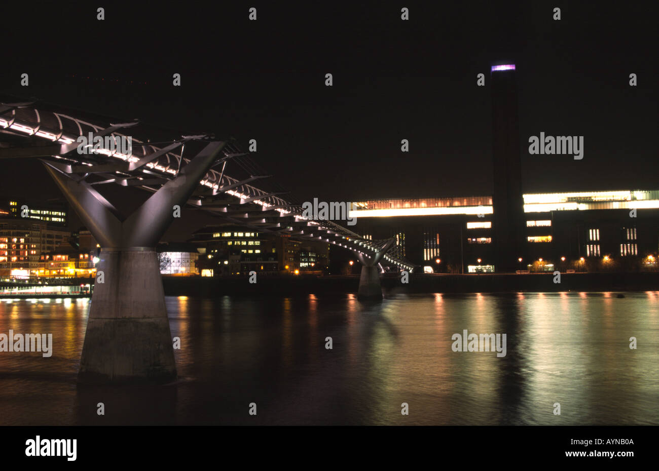 The Millenium Bridge river crossing at night with the Tate Modern in ...